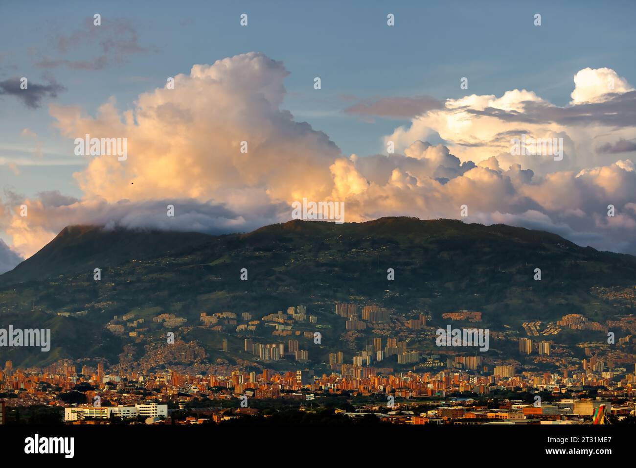 Hill with buildings in Medellin, Colombia, during sunset Stock Photo ...