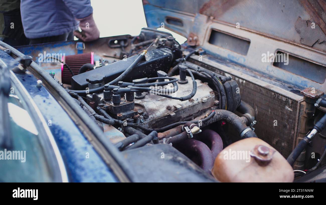 Close-up of engine details of old car. Clip. Engine parts of old car ...