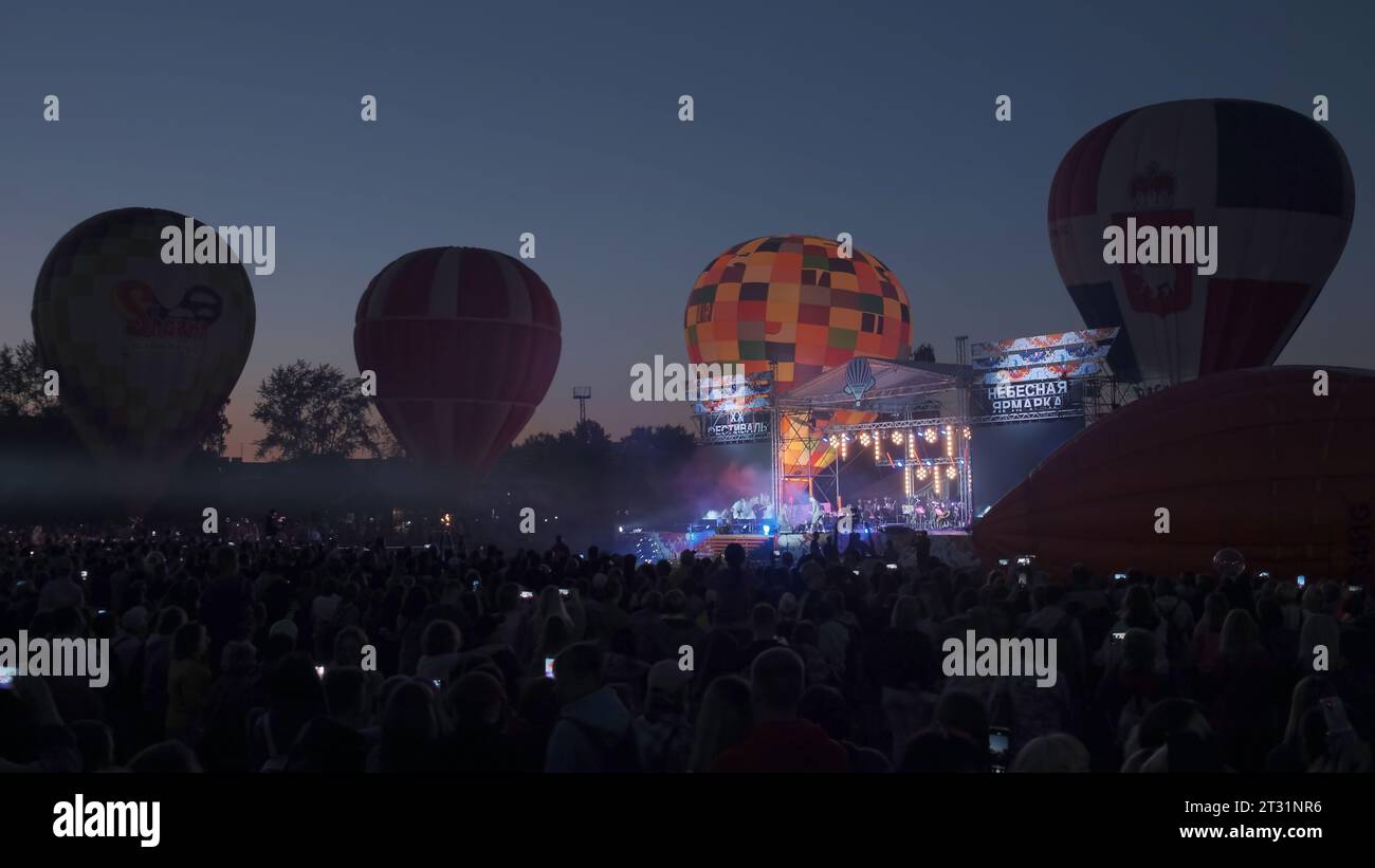 Musical concert with balloons. Clip. Crowd of people at musical concert ...