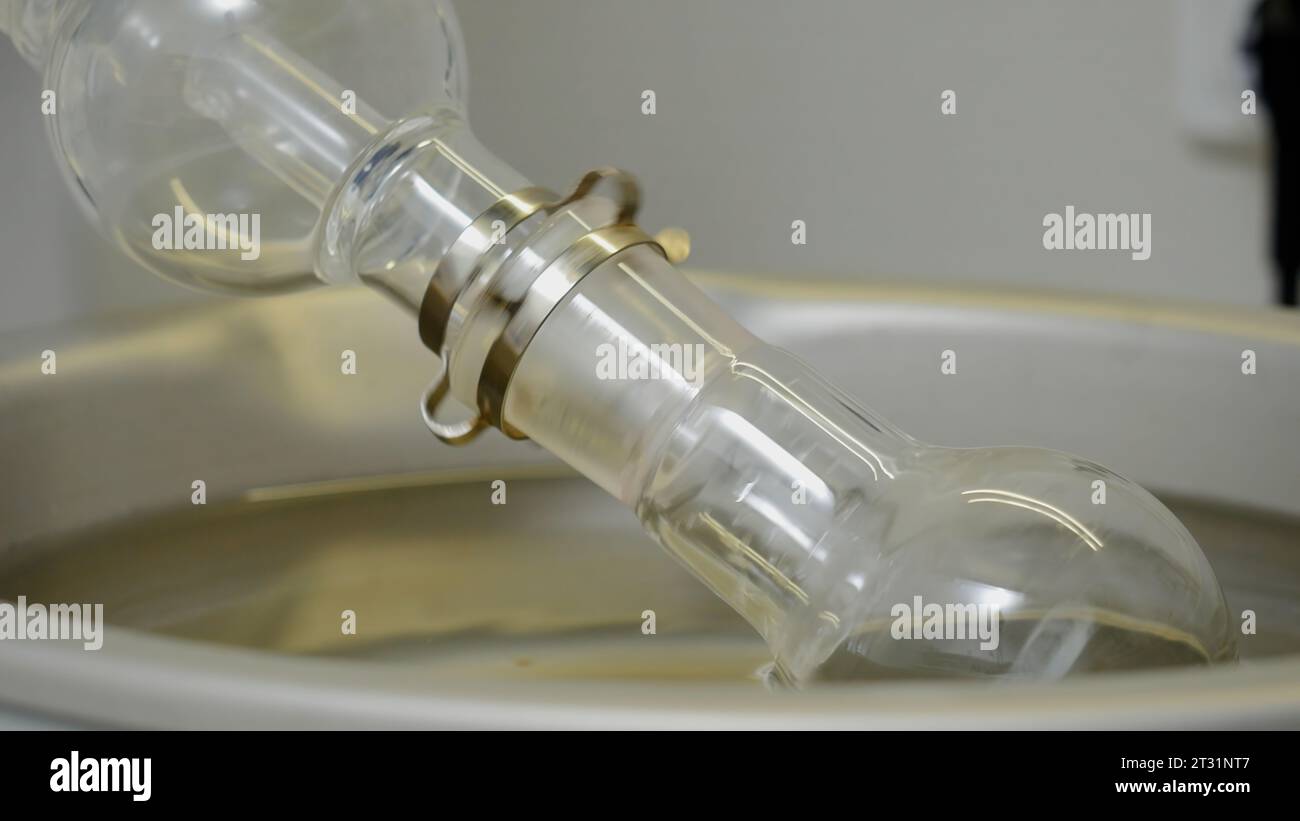 Flushing of test tubes. Stock footage. In a special laboratory, test ...