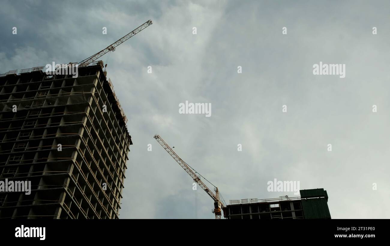 Construction works. Concept. Large buildings under construction with ...