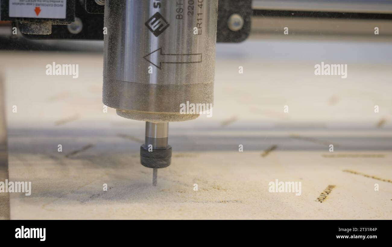 Close-up of wood cutting machine. Media. Industrial machine cutting ...