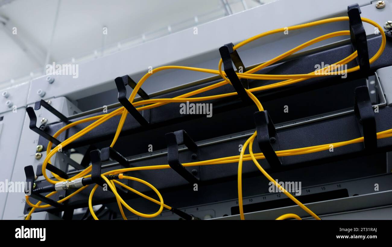 Yellow bright thin wires. Stock footage. Intertwined wires in ...