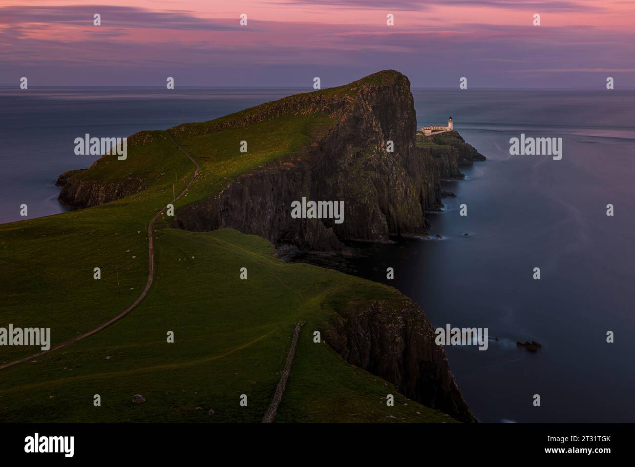 Neist Point is a dramatic headland on the Isle of Skye, with towering ...