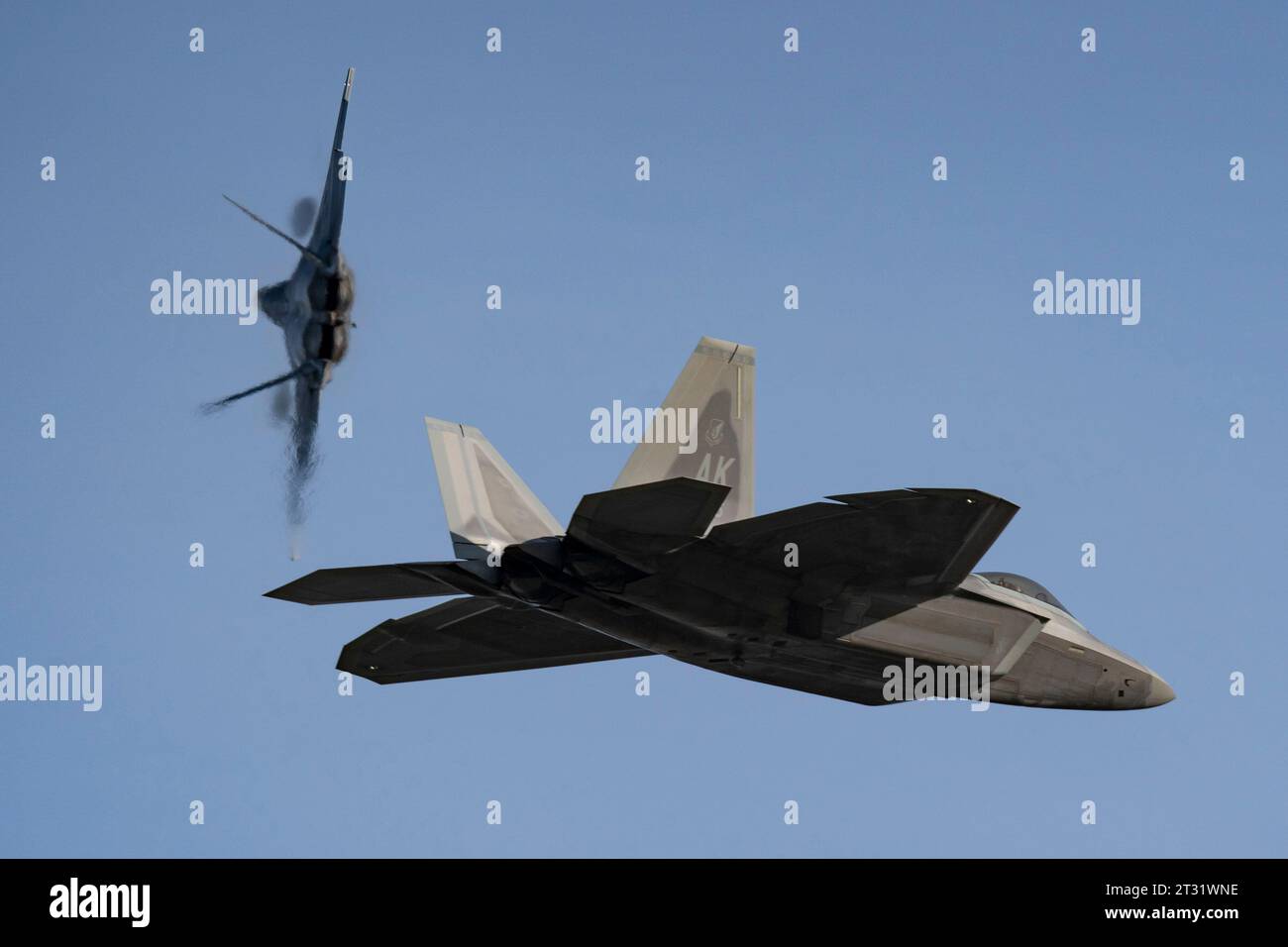 Two F-22 Raptors conduct flight operations at Joint Base Elmendorf ...