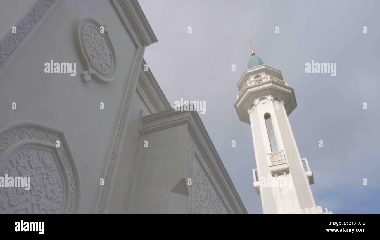 Exterior of a white mosque, concept of religion and architecture. Scene ...