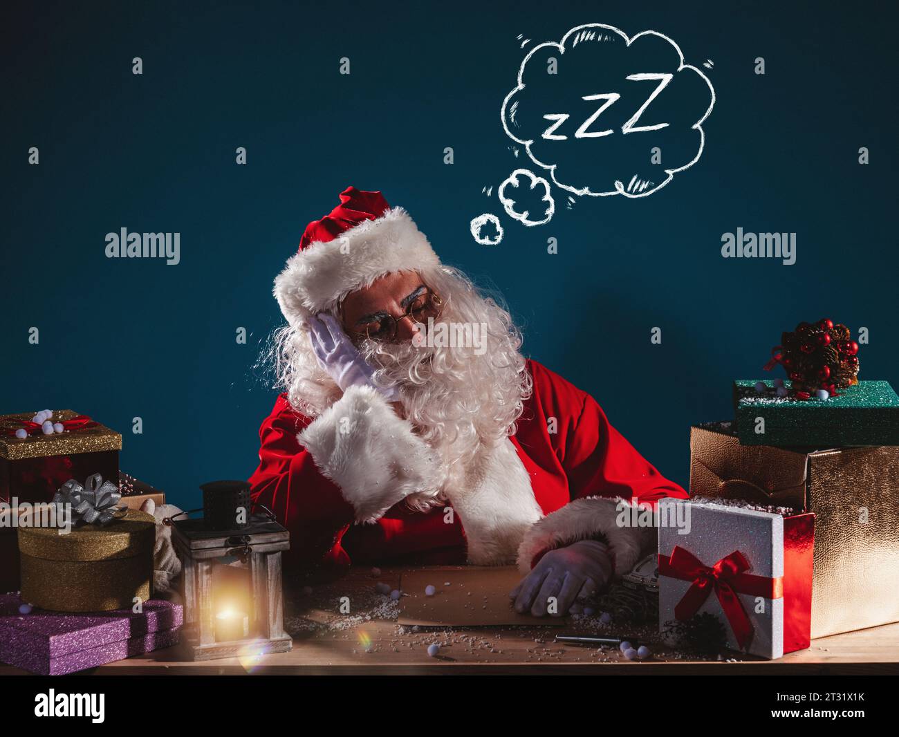Tired santa claus is sleeping due to christmas overwork Stock Photo - Alamy