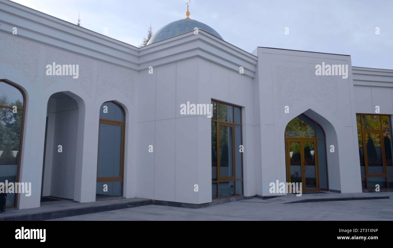 Exterior of a white mosque, concept of religion and architecture. Scene ...