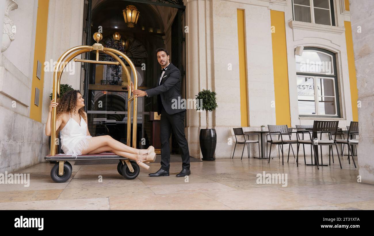 A beautiful couple on a date. Action. Young people in beautiful outfits ...