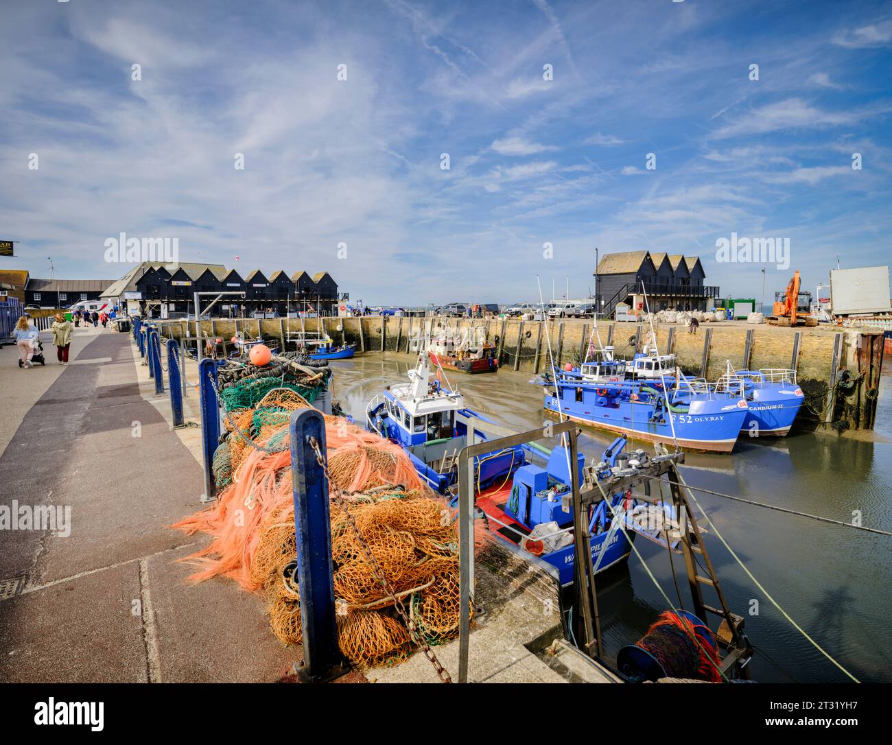 Editorial Use Only - Low tide in Whitstable harbour, fishing boats ...