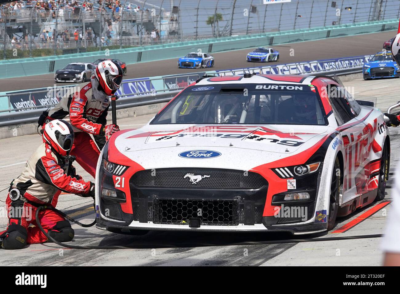 Driver Harrison Burton (21) makes a pit stop during the NASCAR Cup ...
