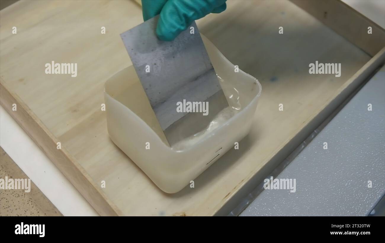 Analysis of plate in solution. Clip. Close-up of man in office oxidizes ...