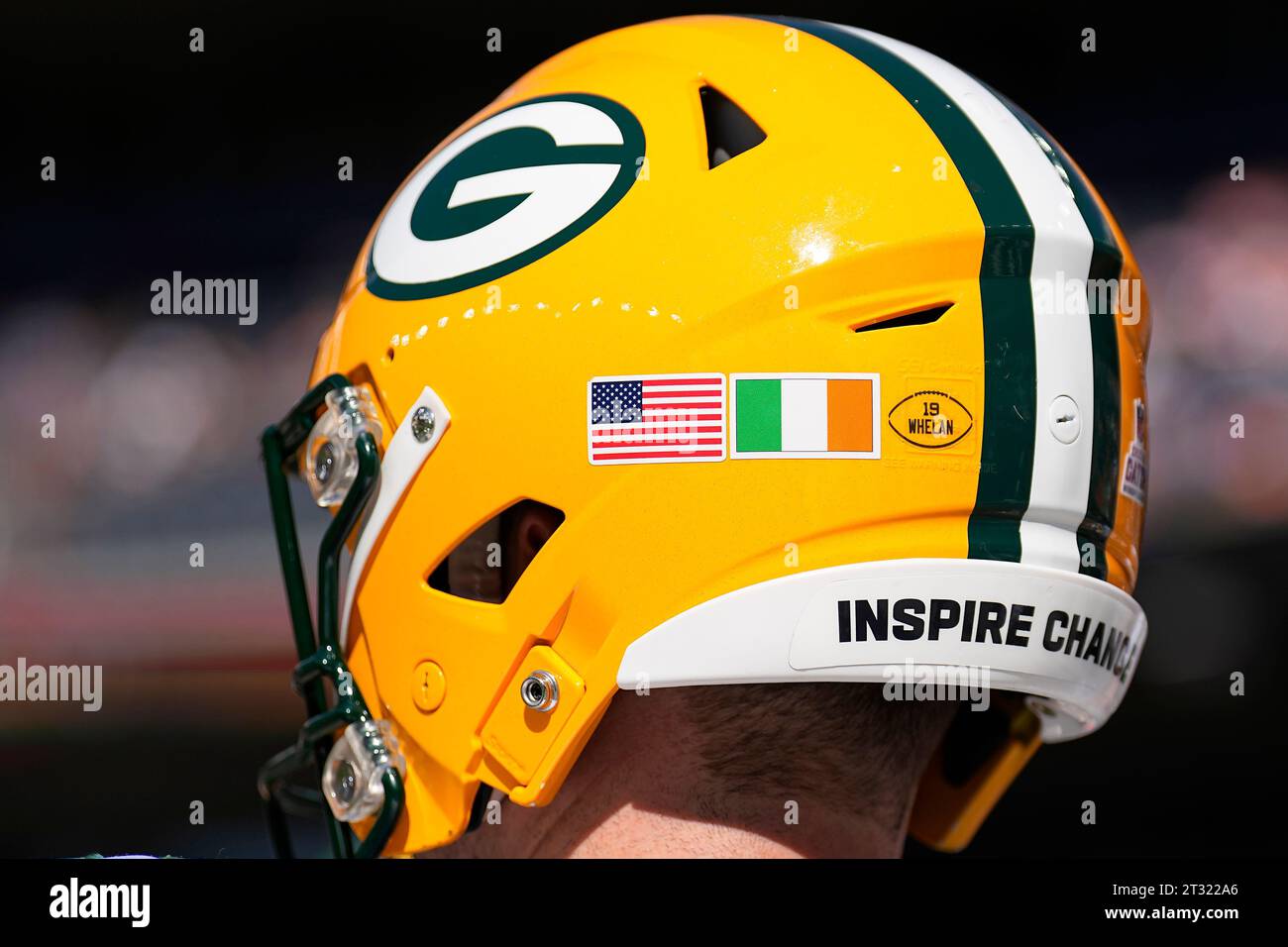 An international flag decal is shown on the helmet of Green Bay Packers ...
