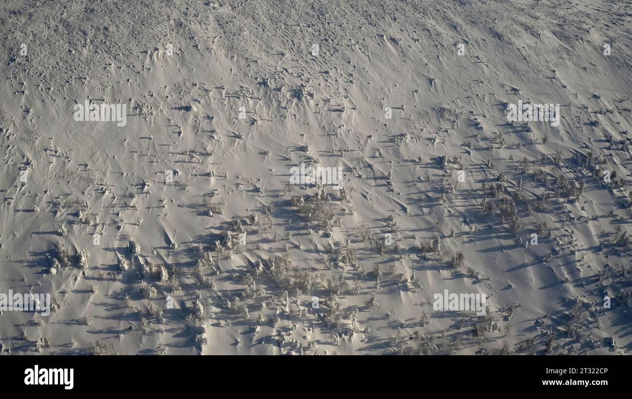 Winter empty fields. Clip. Protruding boulders from the ground are ...