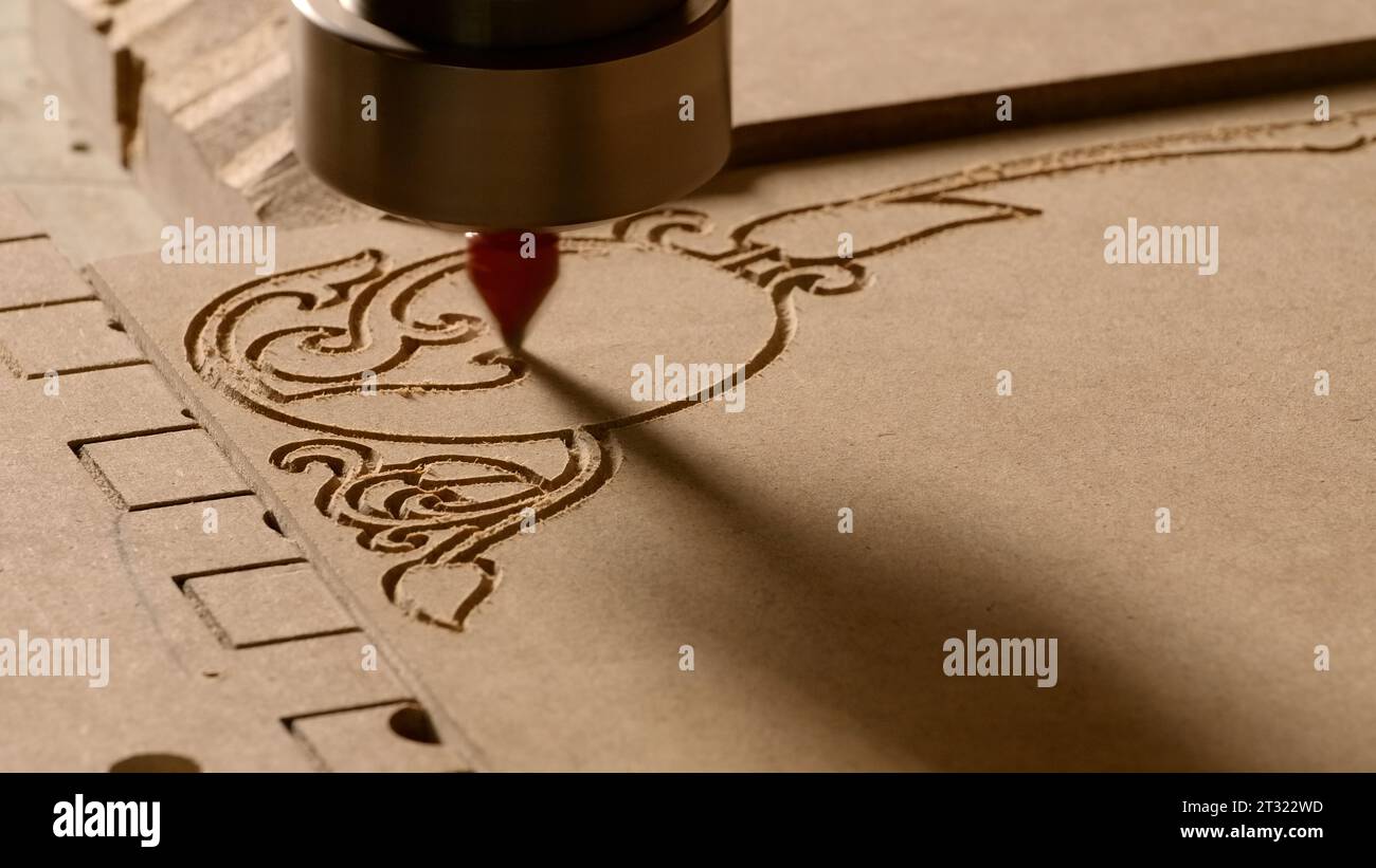 Drawings on wood. Creative. Sawing on a tree with a special cutter ...