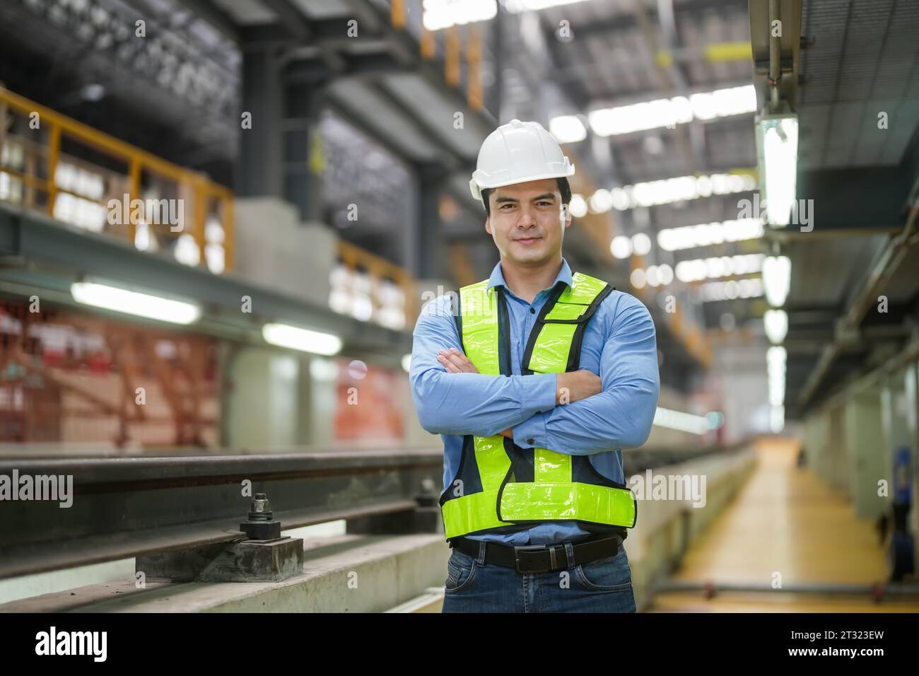 Engineer inspecting sky train in the maintenance plant Stock Photo - Alamy