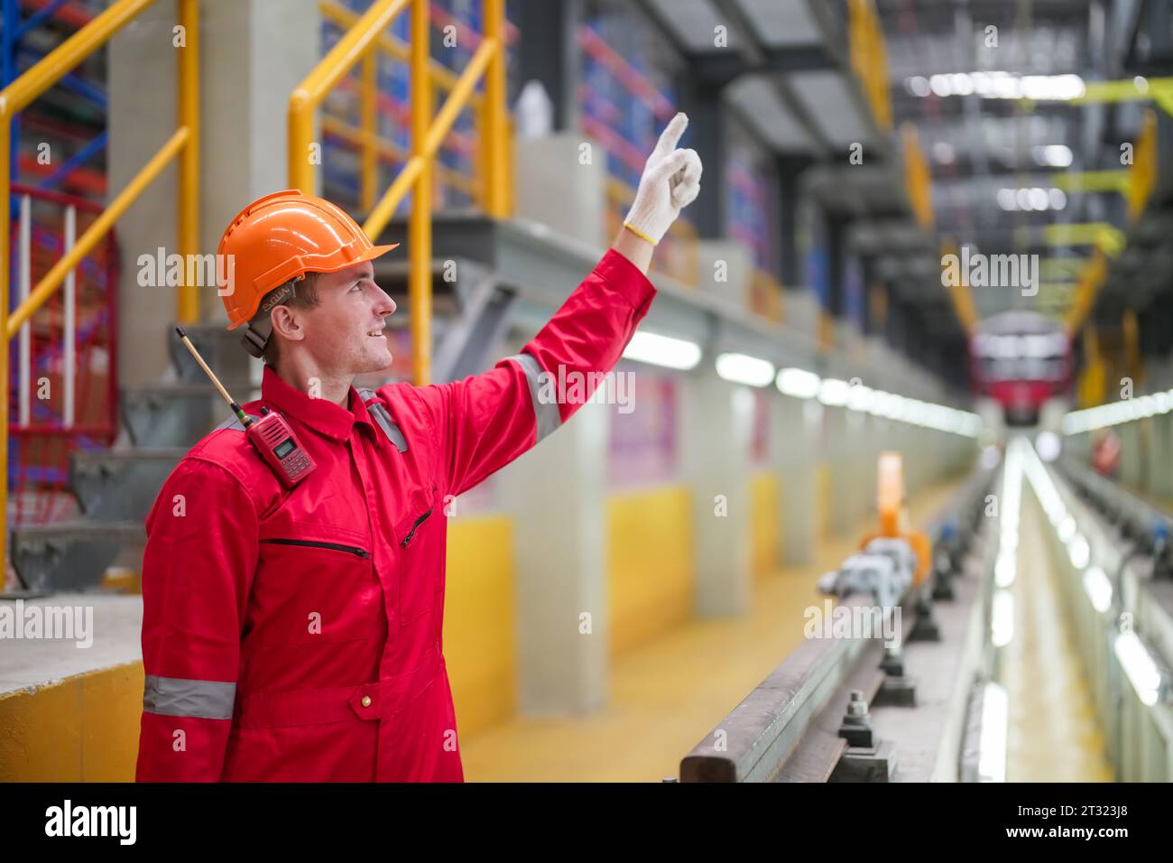Engineer inspecting sky train in the maintenance plant Stock Photo - Alamy