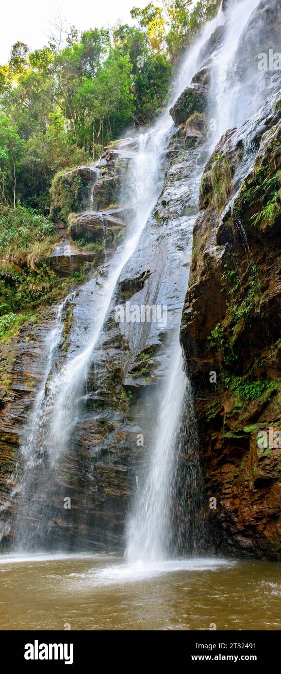 Rocks covered by moss at the waterfall inside the rainforest in Minas ...