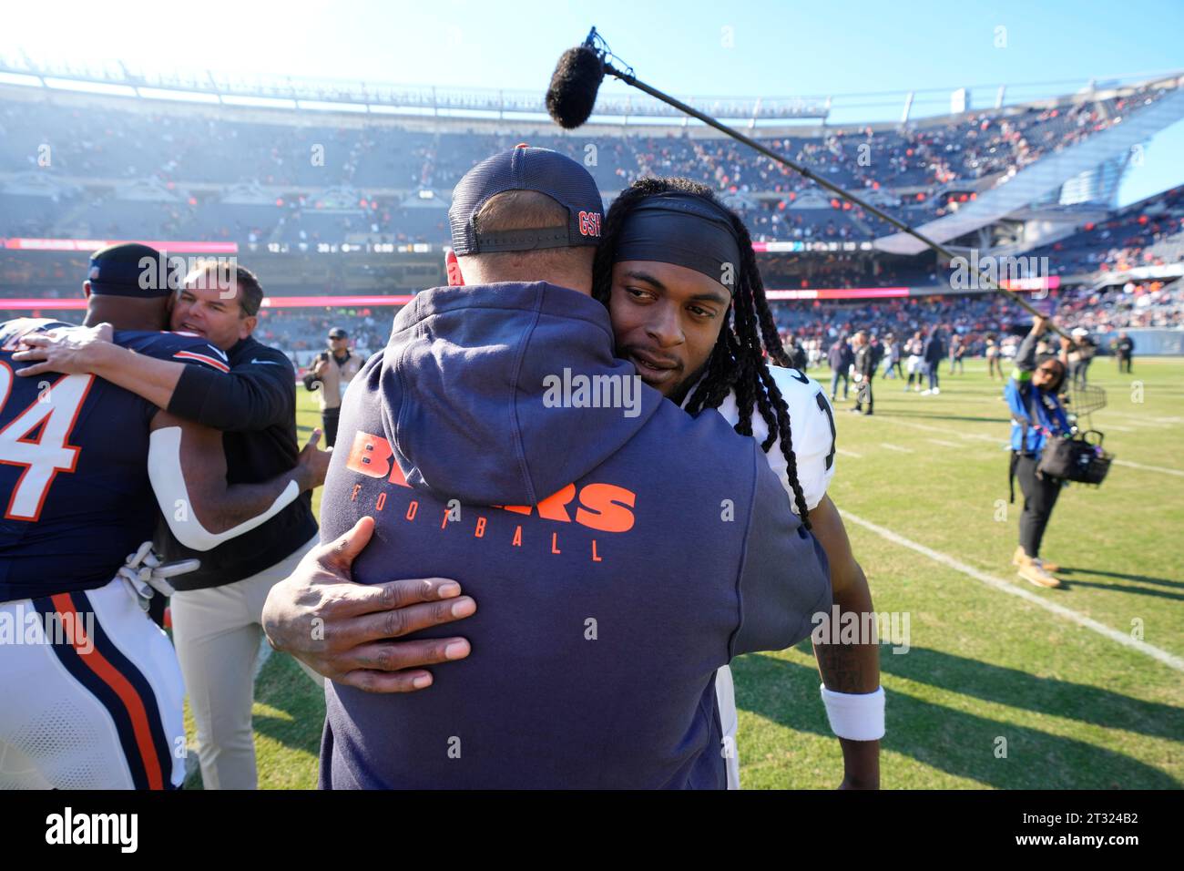 Las Vegas Raiders wide receiver Davante Adams, right, hugs Chicago ...