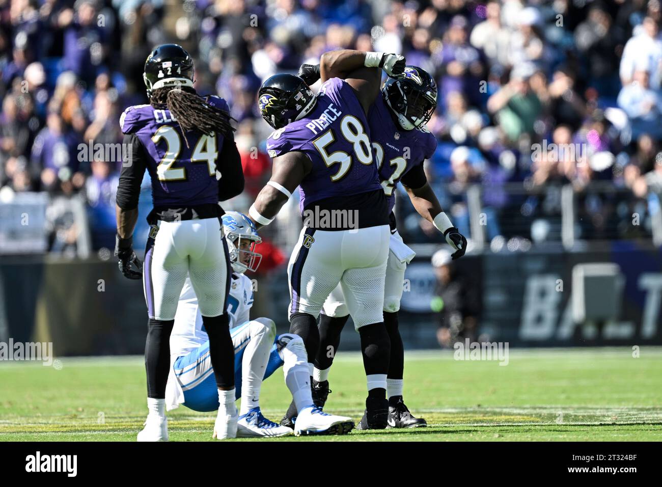 Baltimore Ravens defensive tackle Michael Pierce (58) and defensive ...