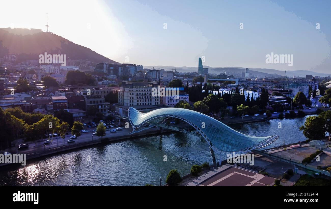 Fantastic drone point of view on Tbilisi cityscape with Kura river ...