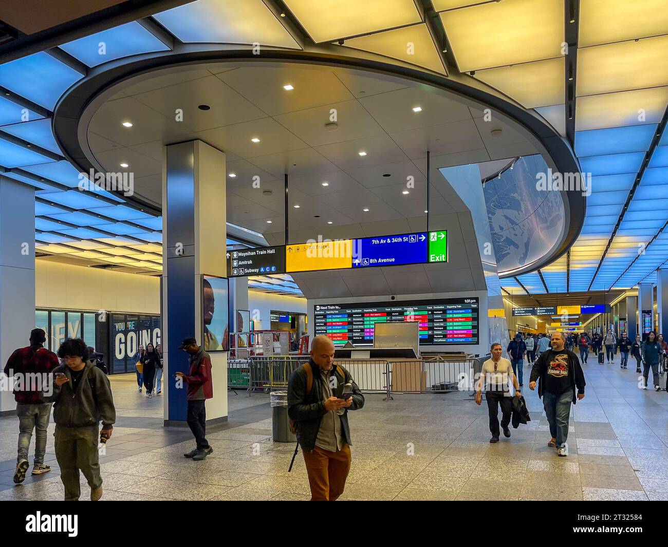 New York, NY – US - Oct 11, 2023 Travelers passing through the Long ...