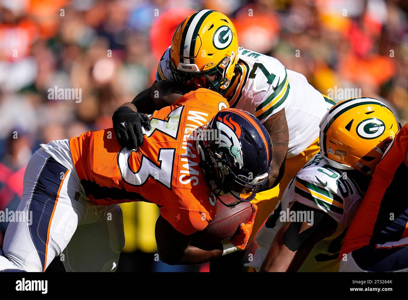 Green Bay Packers linebacker Quay Walker (7) tackles Denver Broncos ...