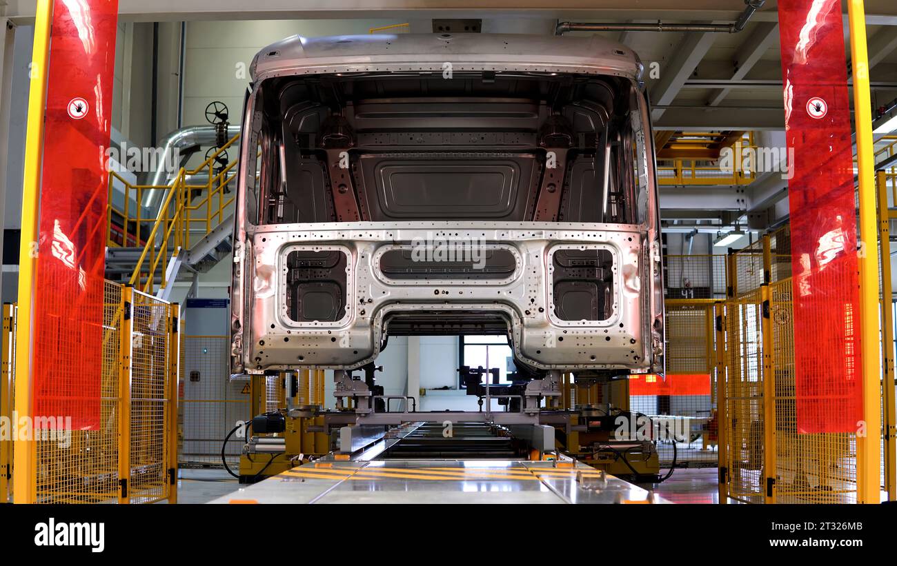 Car assembly. Scene. The disassembled body of the car that is being ...