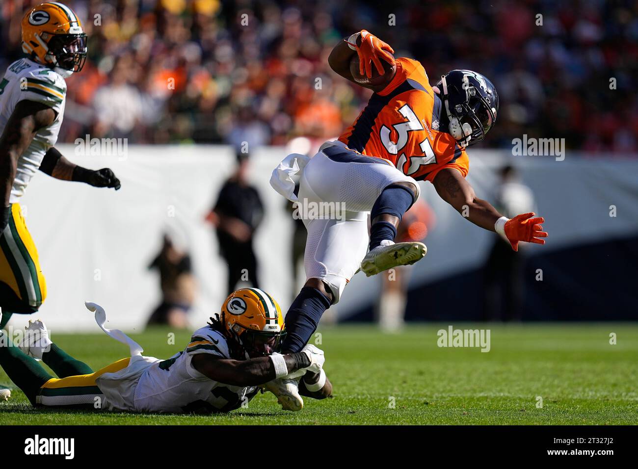 Denver Broncos running back Javonte Williams (33) runs against Green ...