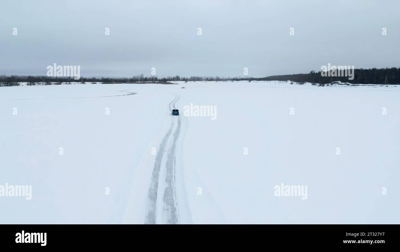 Movement cars on turn winter hi-res stock photography and images - Alamy
