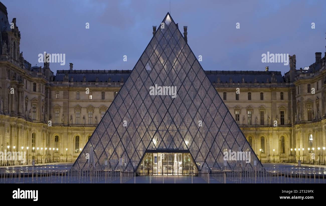 Louvre pyramid, famous landmark and tourist attraction in Paris, France ...