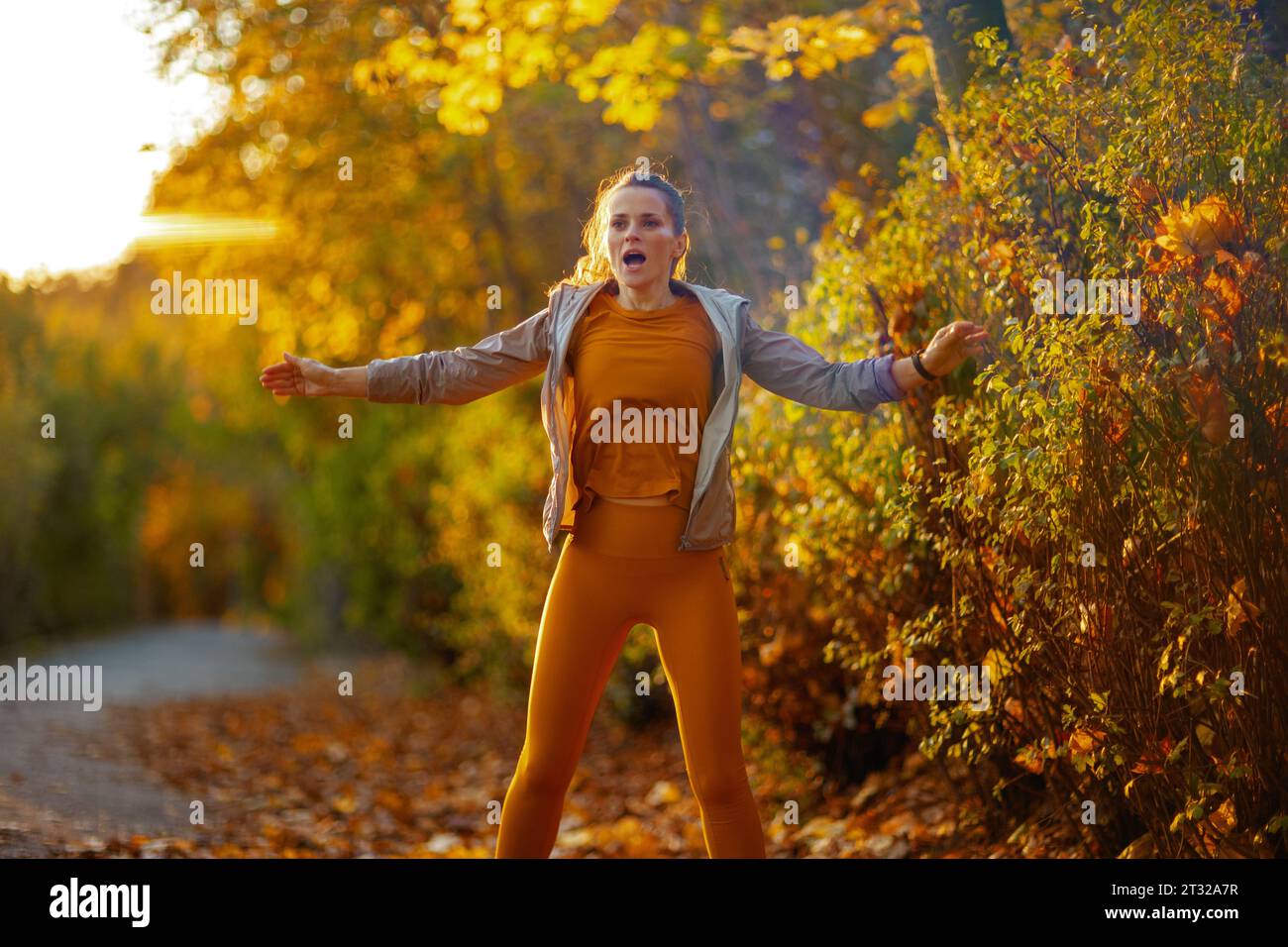 Hello autumn fit woman hi-res stock photography and images - Alamy