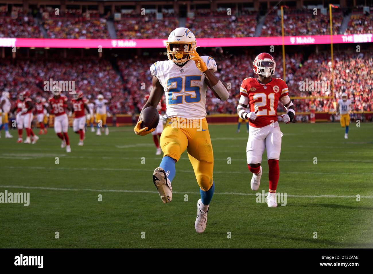 Los Angeles Chargers running back Joshua Kelley (25) scores past Kansas ...