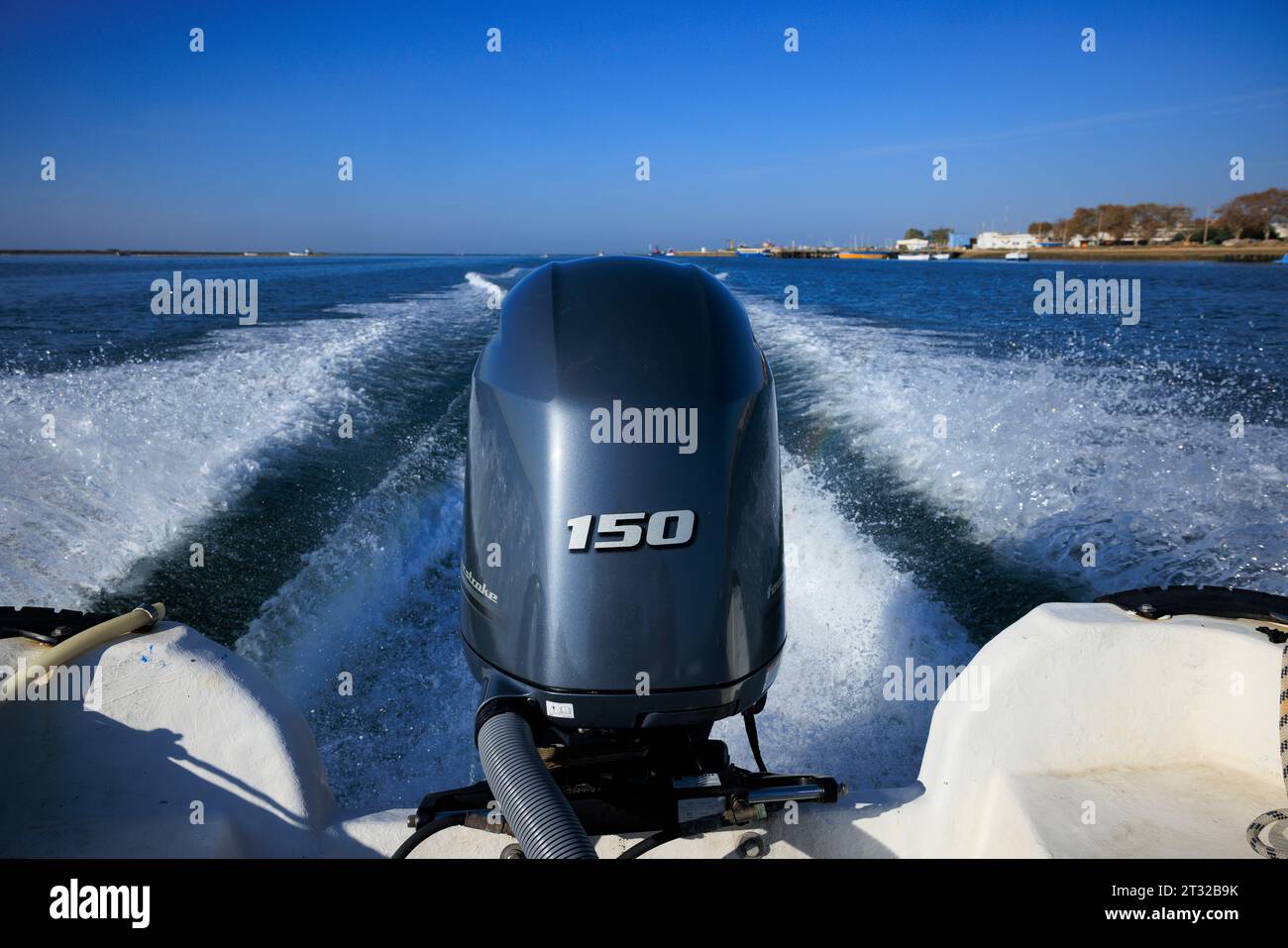 150hp outboard marine engine on a water taxi heading to Ilha da Armona ...