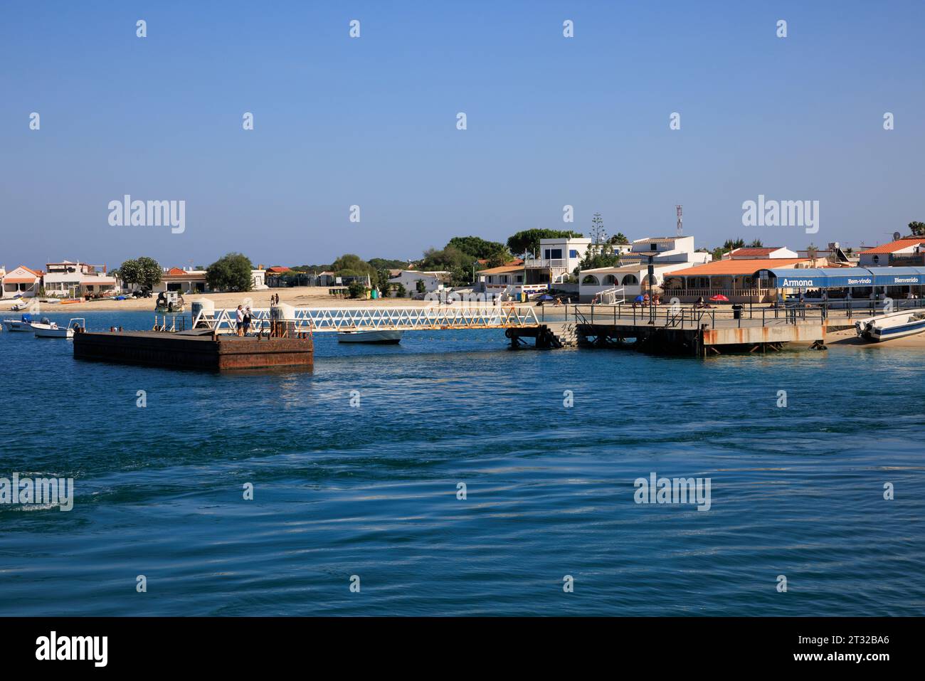 Ferry pier dock on Ilha da Armona (Armona Island) off the coast of ...
