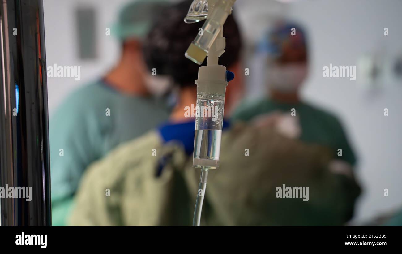 IV drips in the operating room. Images of drops of serum given to the ...