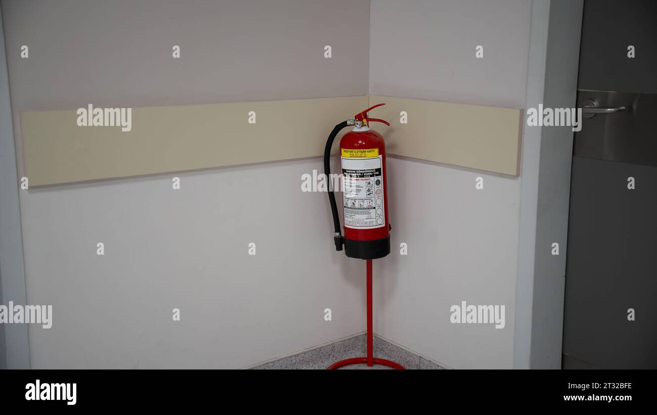 Fire extinguisher in hospital corridor. Fire extinguisher for safety ...