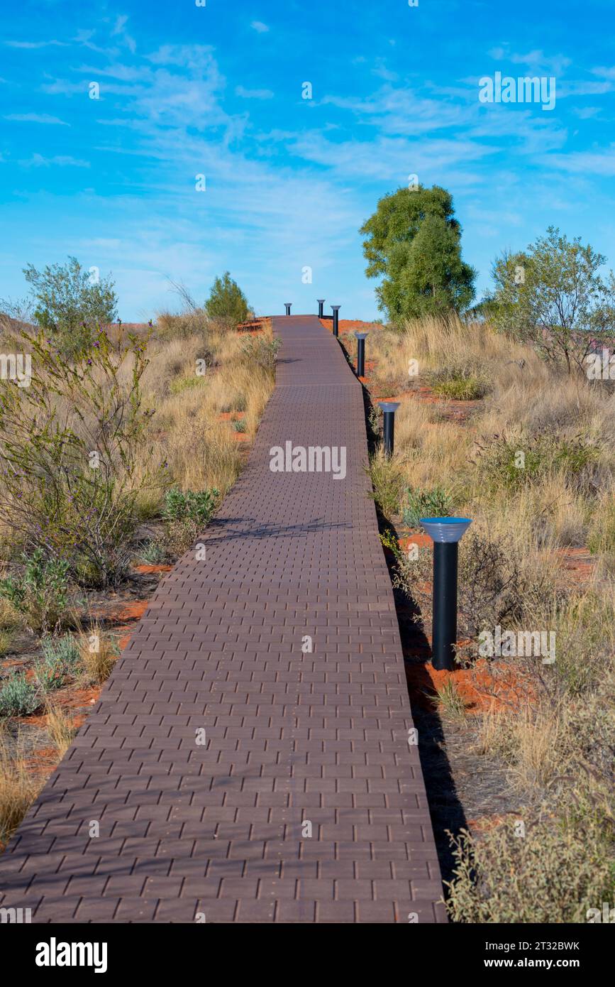 An elevated boardwalk to protect the native grasses and vegetation near ...