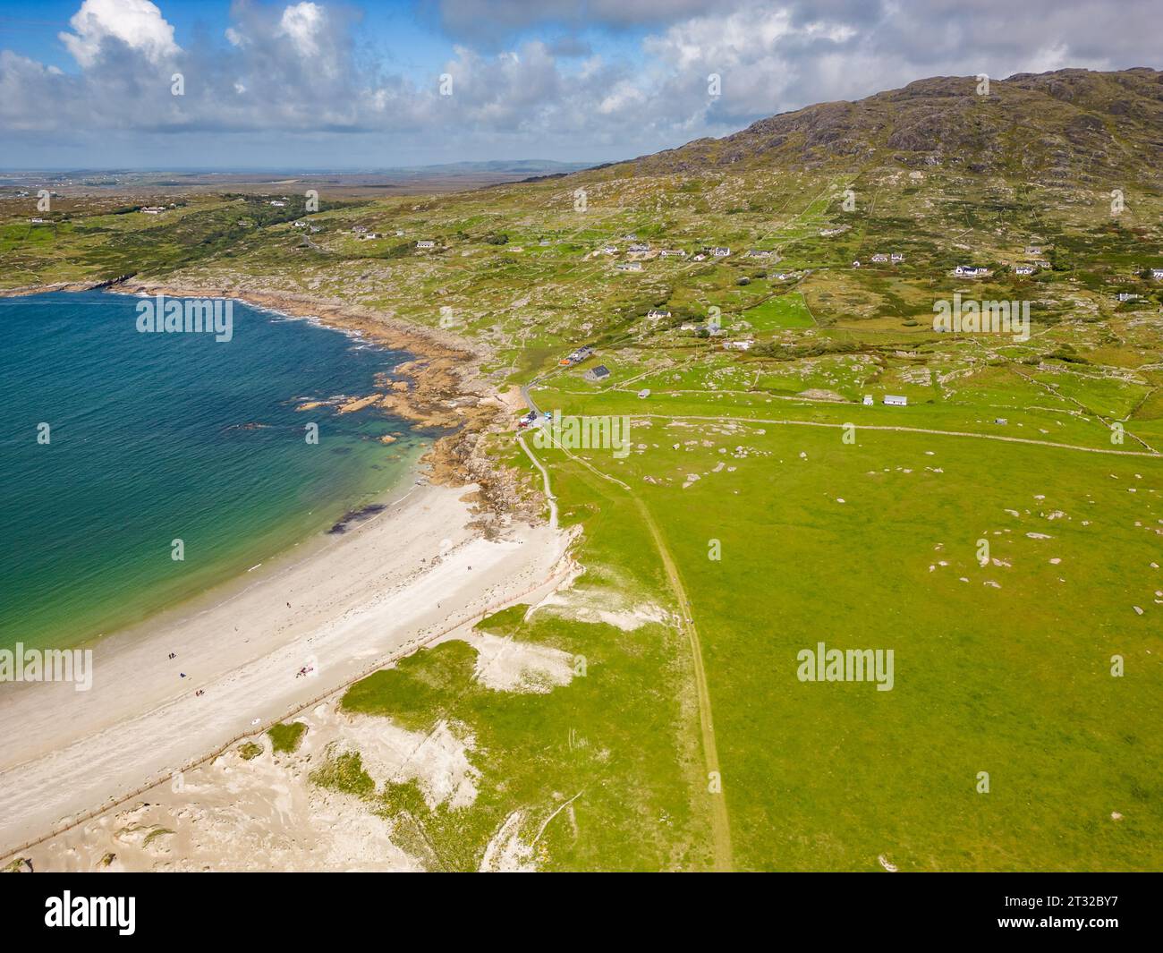 Aerial view of beach and village in Dogs bay, Roundstone, Conemara ...