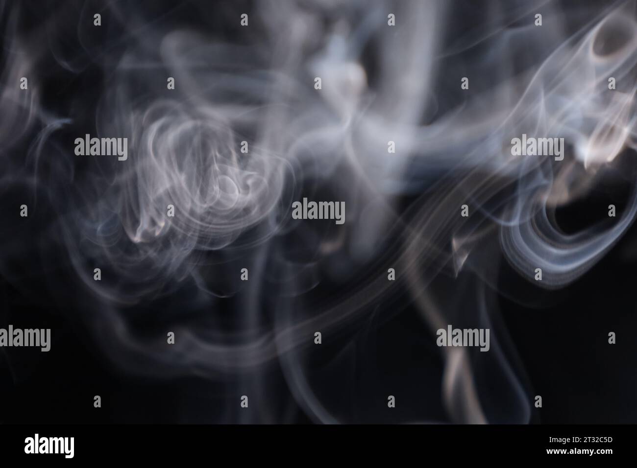 White silver smoke on a dark background, colourful abstract, white fog ...