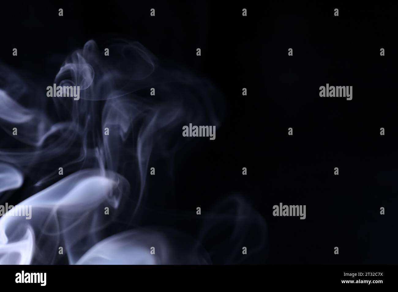 Cold silver smoke on a dark background, colourful abstract, white fog ...