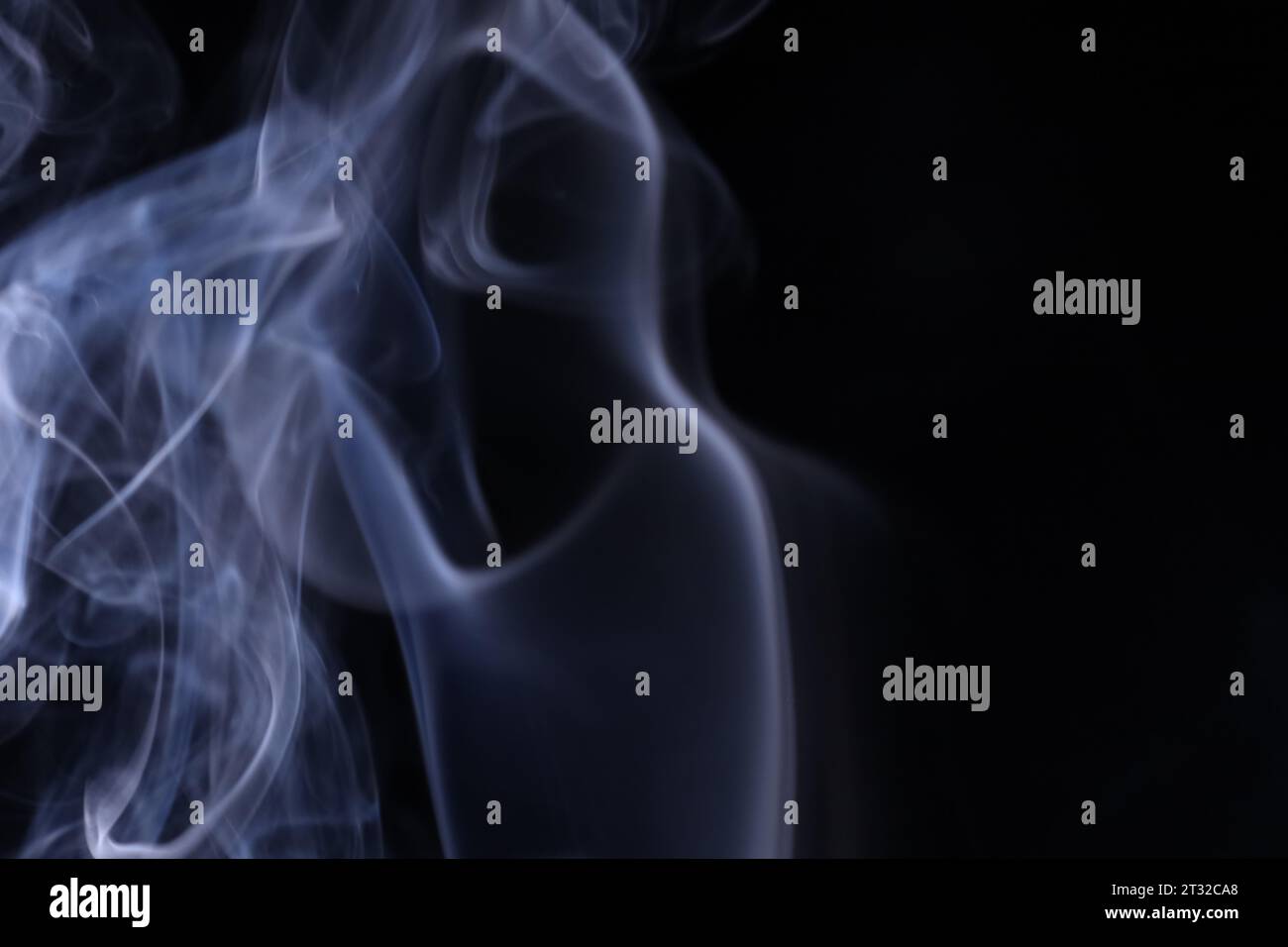 Cold silver smoke on a dark background, colourful abstract, white fog ...