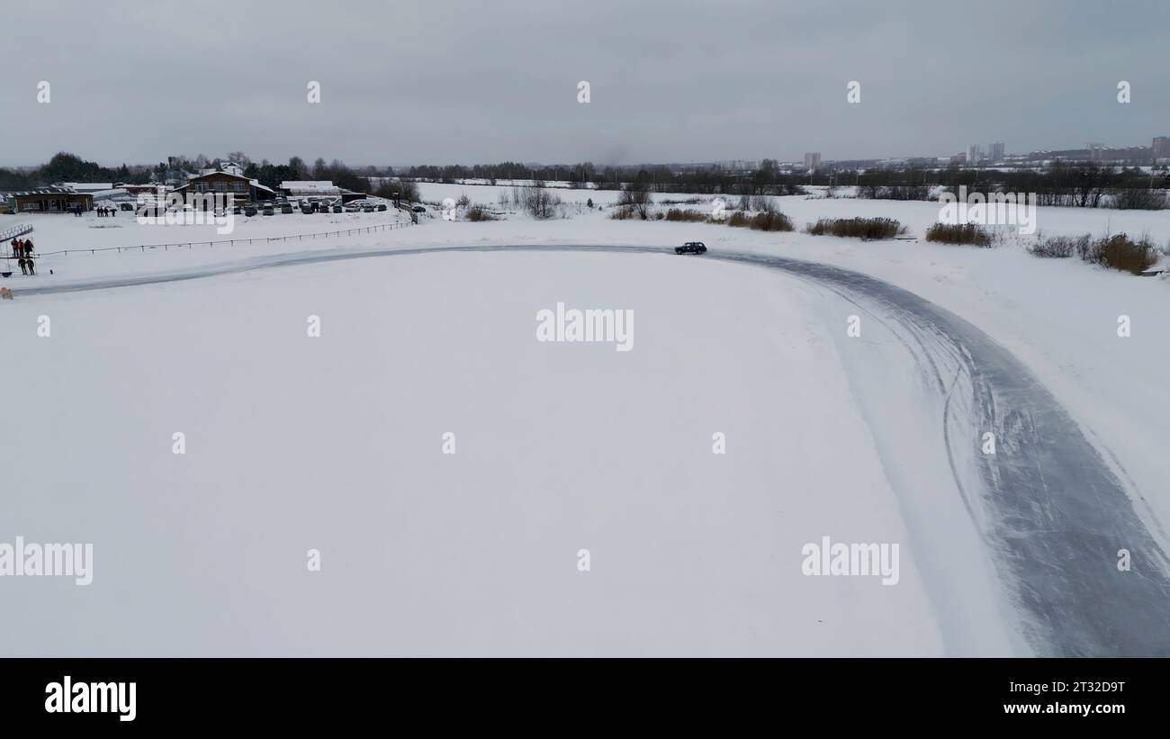 Winter track during race, view from drone. Clip. Aerial view of cars ...