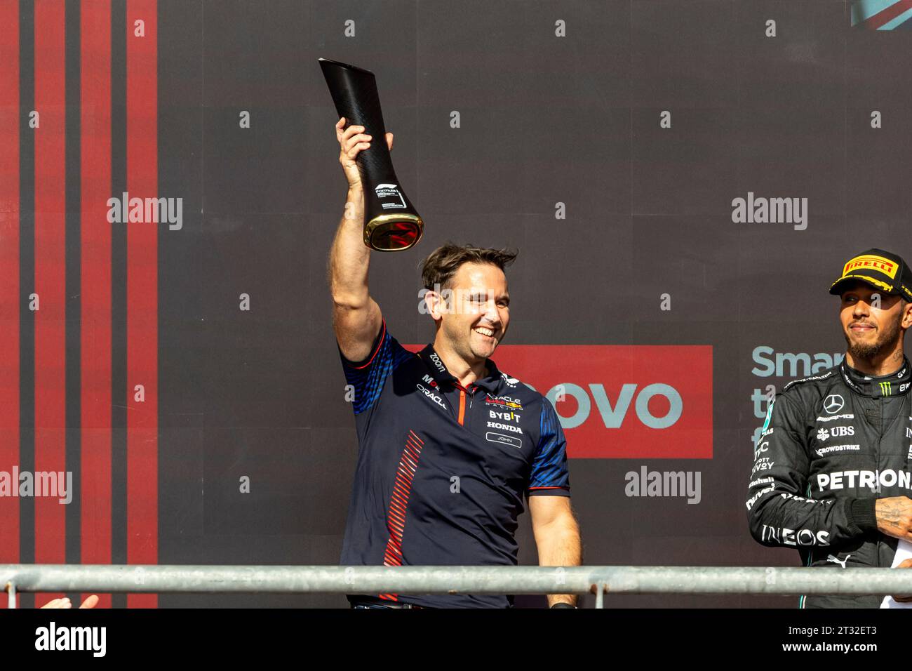 AUSTIN, TX - OCTOBER 22: Oracle Red Bull Racing team member holds up ...