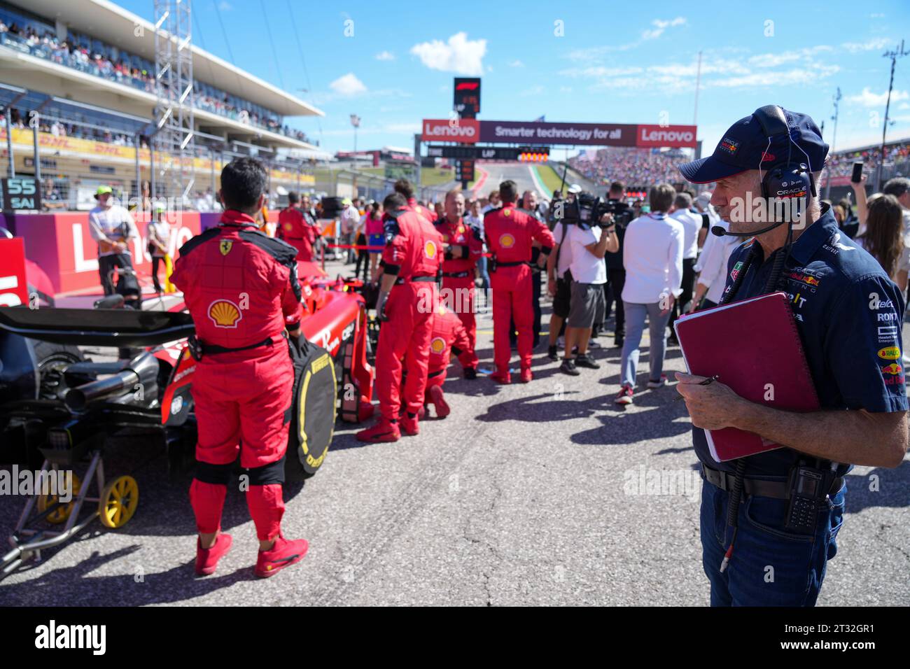 Adrian Newey inspecting Ferrari car on starting grid during the United ... Adrian Newey inspecting Ferrari car on starting grid during the United ...