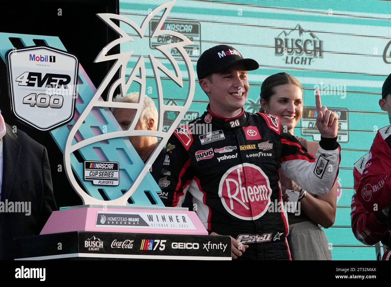 Christopher Bell poses with the trophy after winning the NASCAR Cup ...