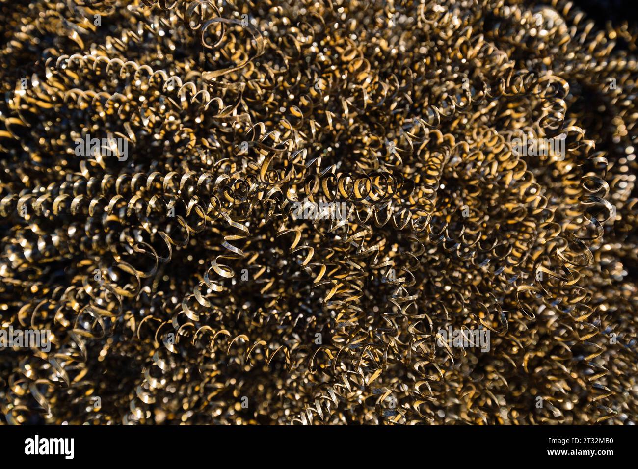 Spiral metal chips in metalworking production Stock Photo - Alamy