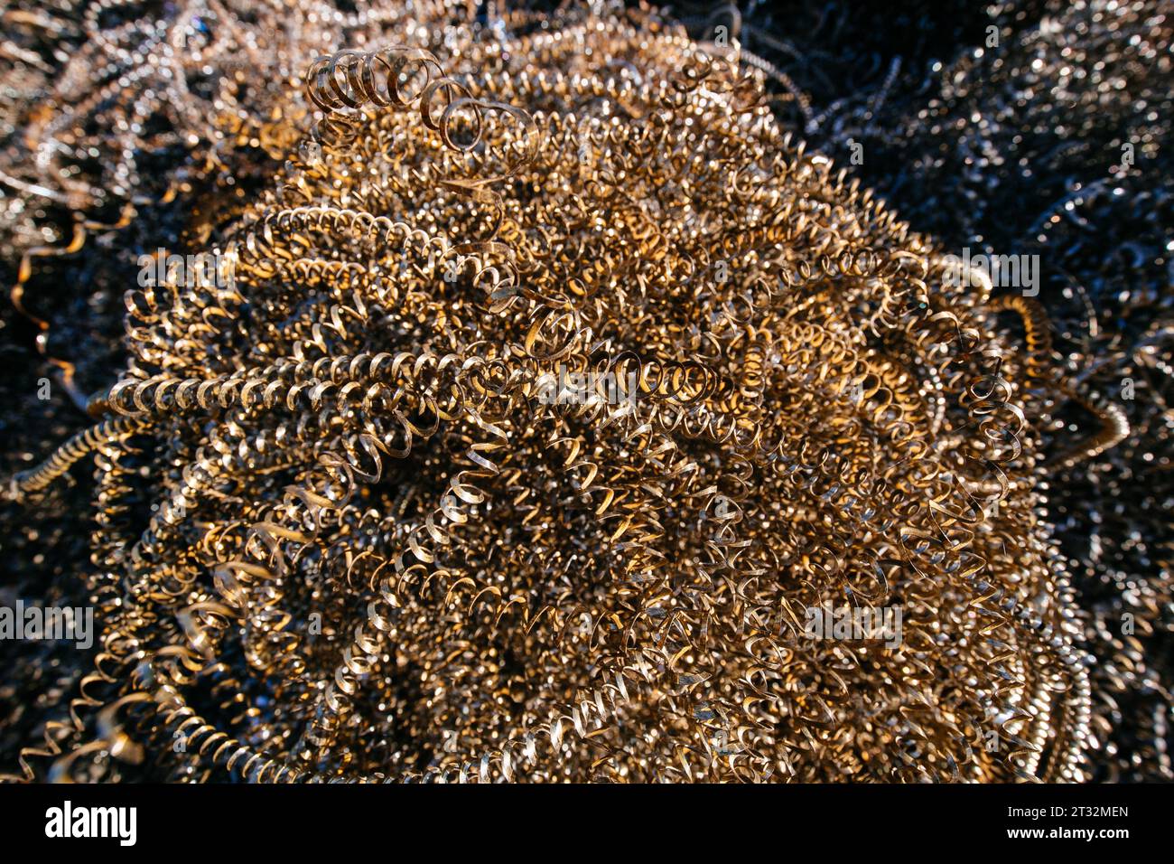 Spiral metal chips in metalworking production Stock Photo - Alamy
