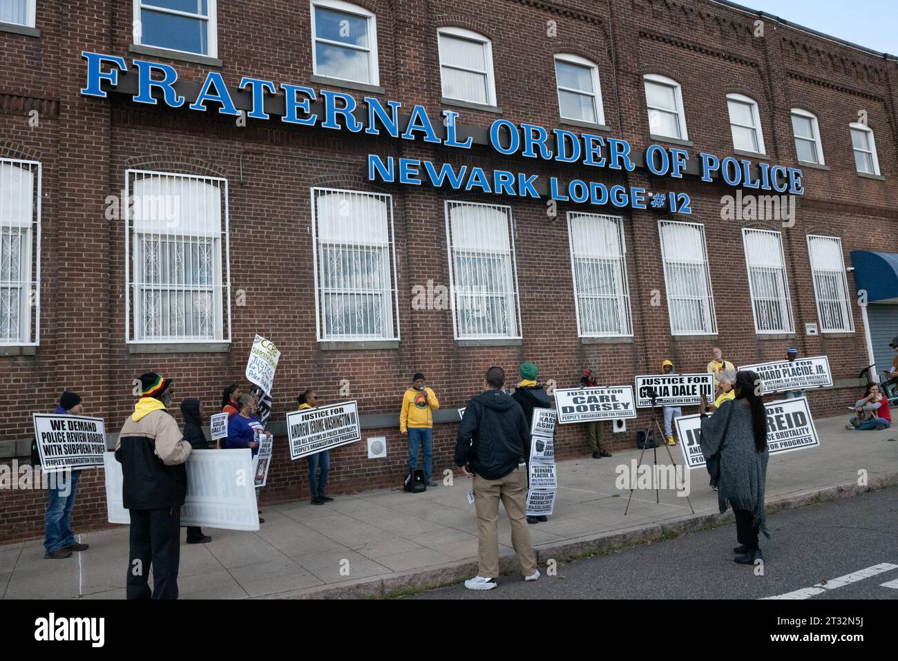 Newark, New Jersey, USA. 22nd Oct, 2023. Center, LARRY HAMM, leads a ...