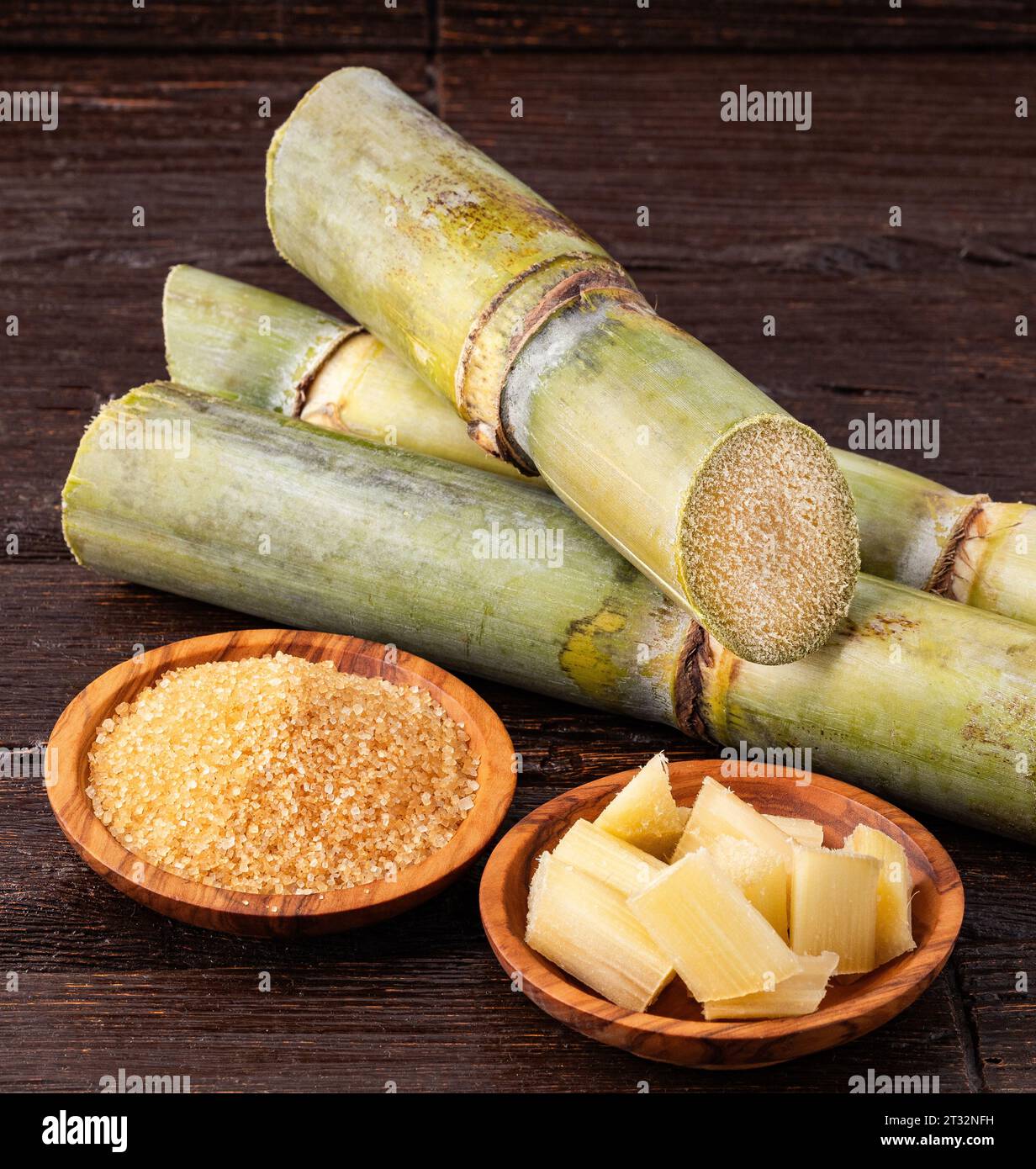 Saccharum officinarum - Brown sugar with natural cane stems Stock Photo ...